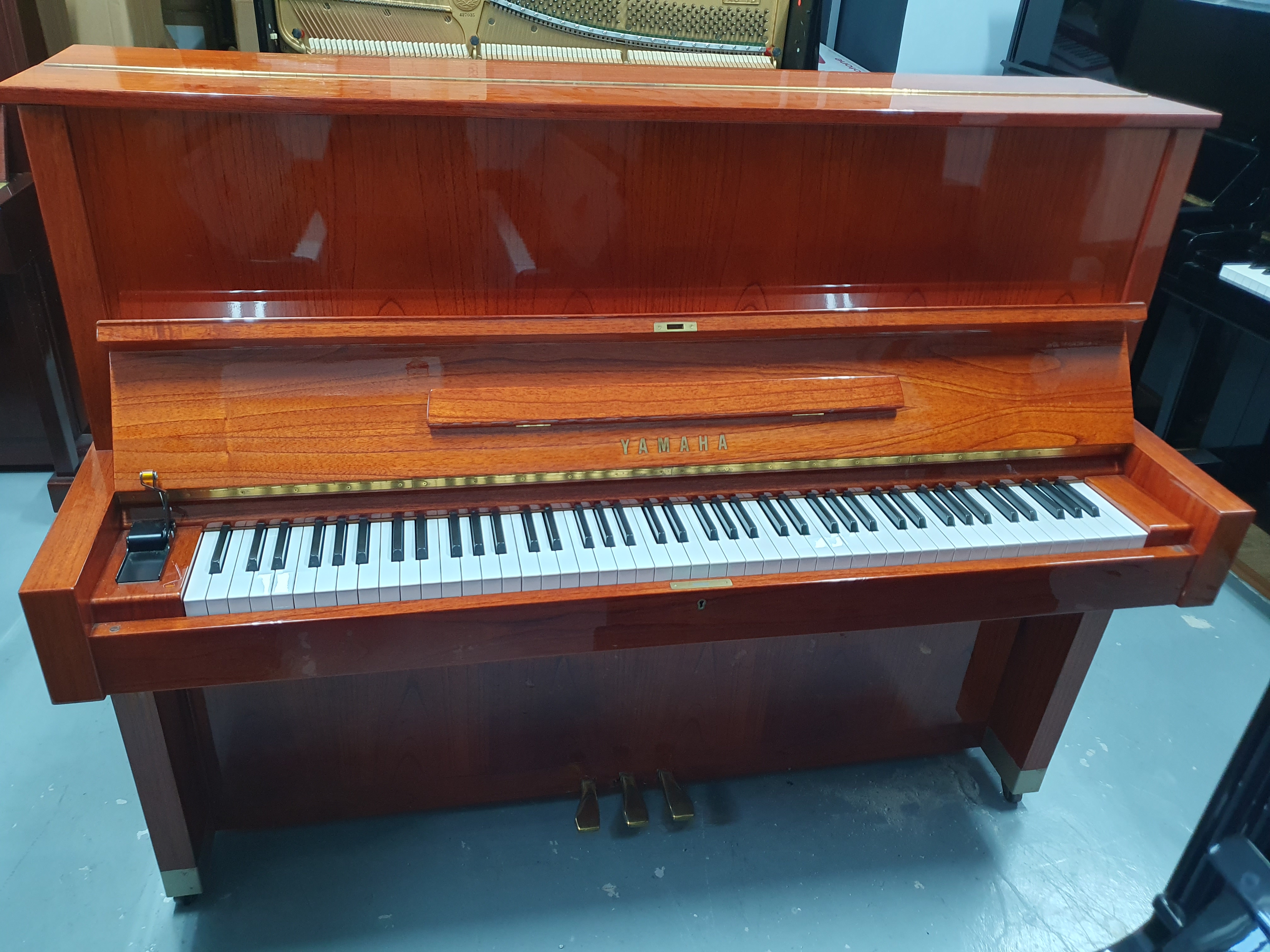Yamaha W104 Upright Piano: Timeless Elegance with Rich, Resonant Tones